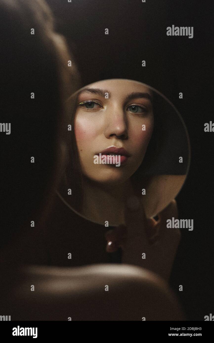 Young woman reflection mirror hi-res stock photography and images - Alamy