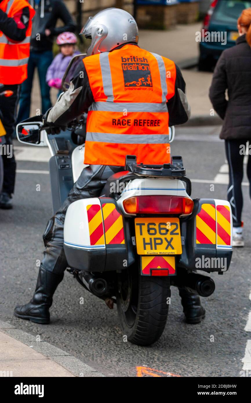 Race referees on motorbikes near the transition area of the Stokesley ...