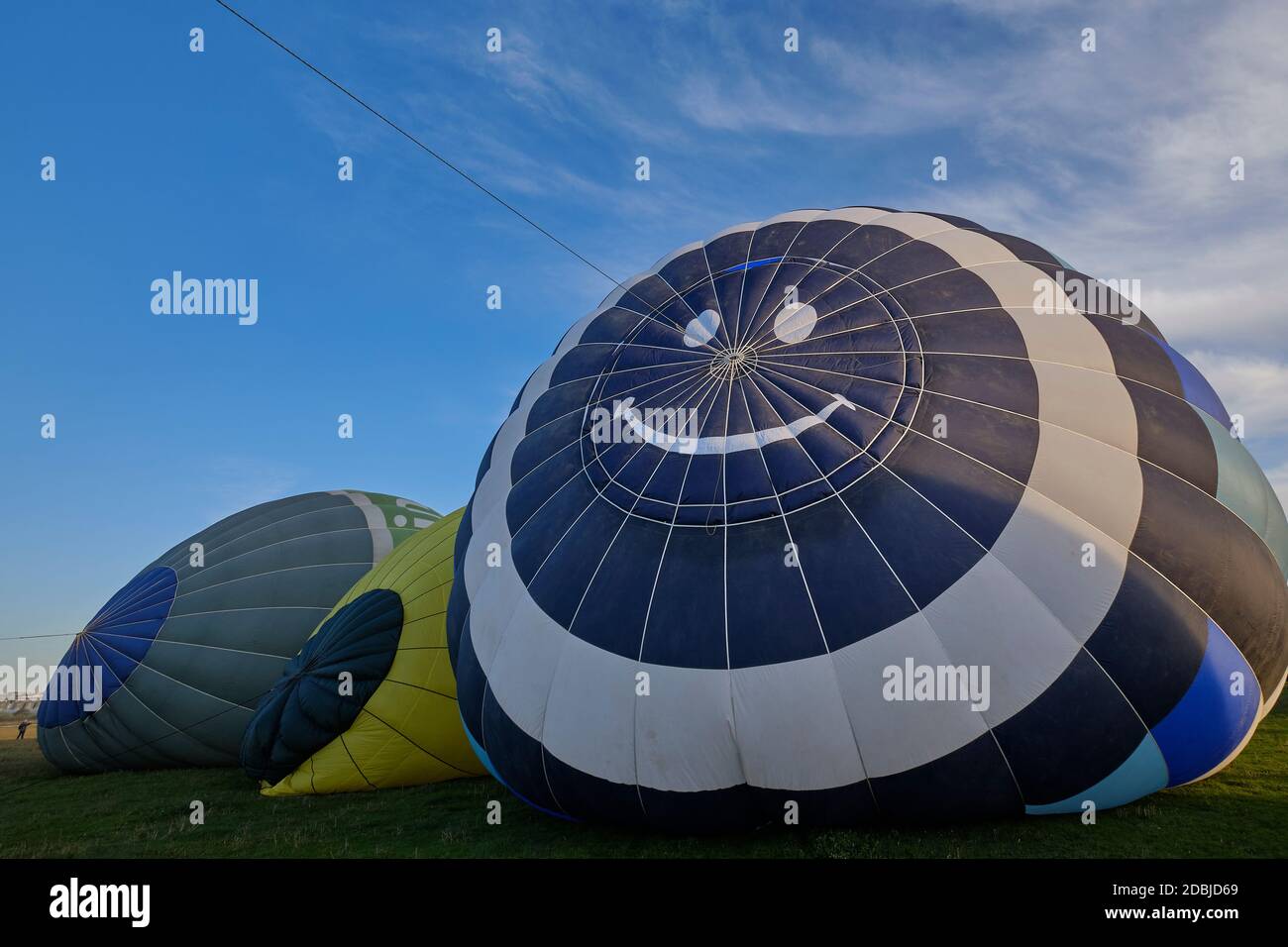 Aerostatic balloon in inflation process with smiley face Stock Photo ...