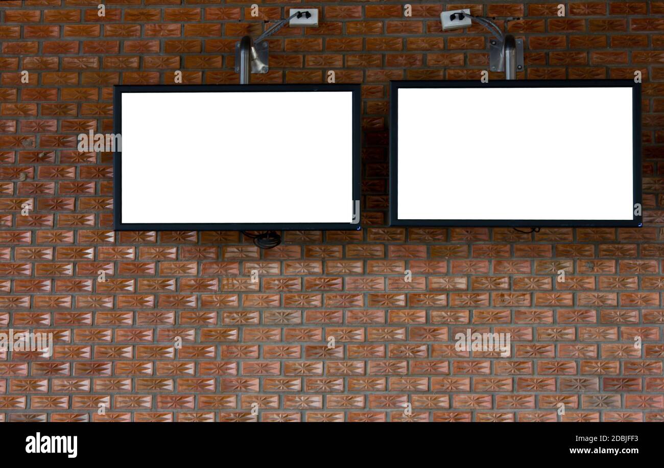 Faux painted and textured rock wall with LCD tv Stock Photo - Alamy