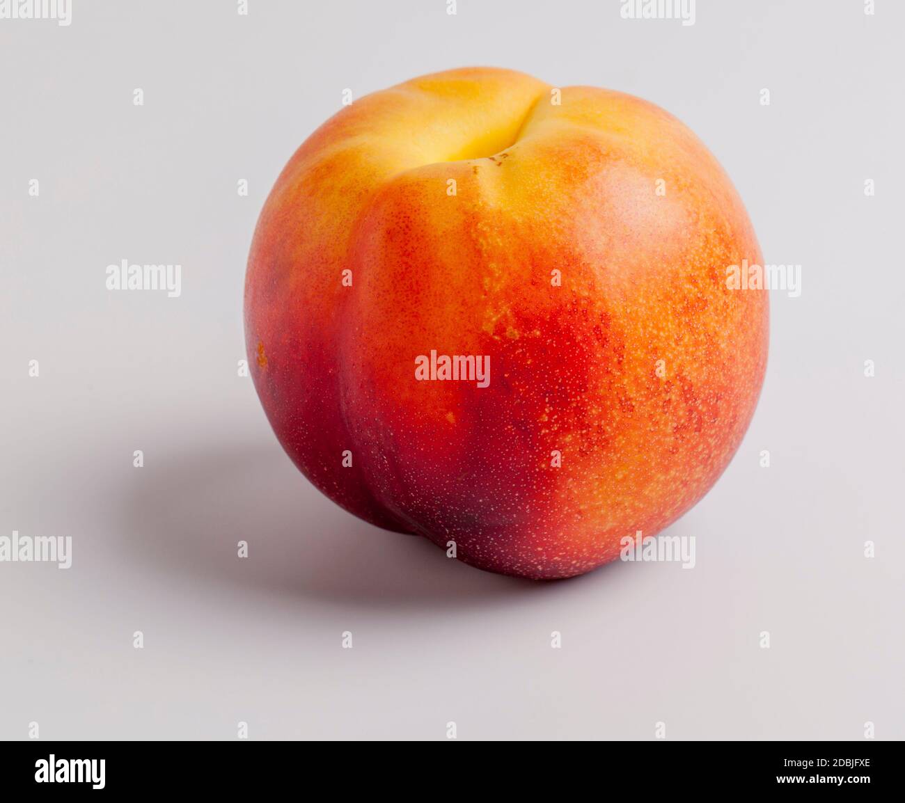 Single Nectarine on White Background Stock Photo - Alamy