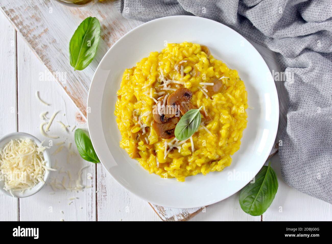 Traditional Italian risotto with mushrooms, saffron and parmesan cheese ...