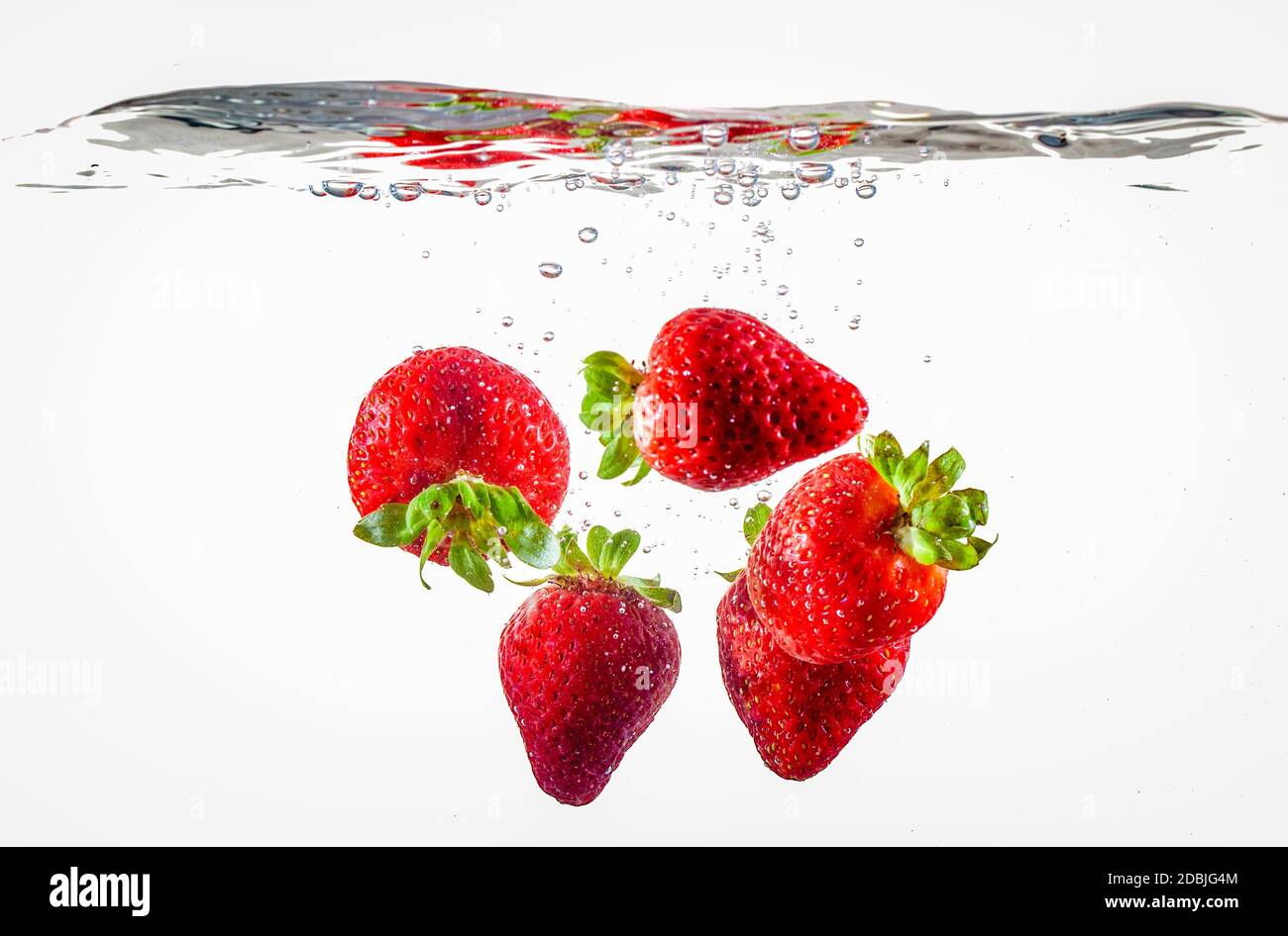 Strawberries in flowing water hi-res stock photography and images - Alamy
