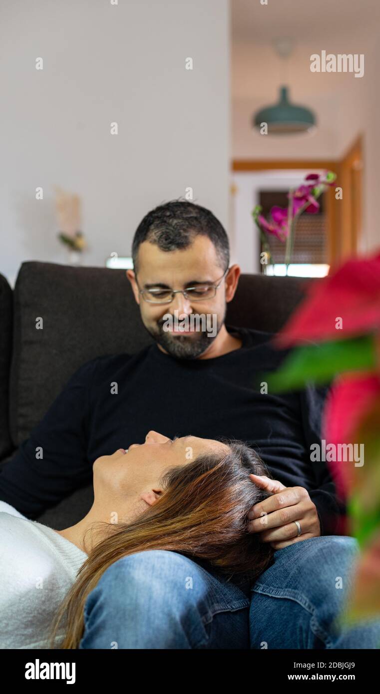 Couple touching legs hi-res stock photography and images - Alamy