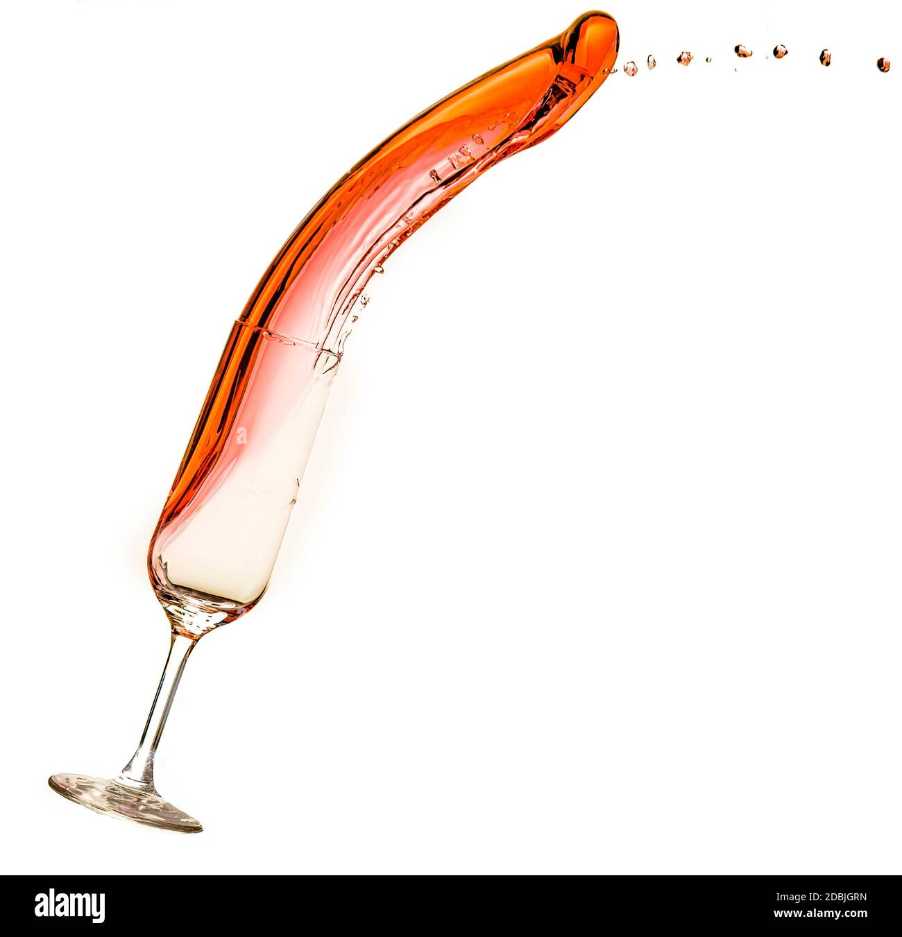 Wine being poured into glass, with slop spilling over Stock Photo - Alamy