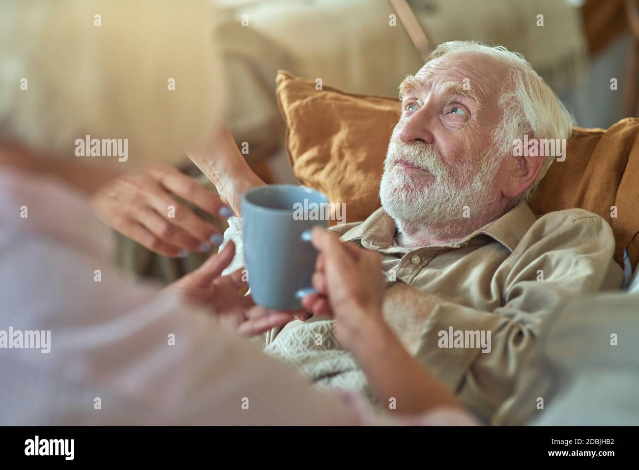 Gray haired man caring hi-res stock photography and images - Alamy