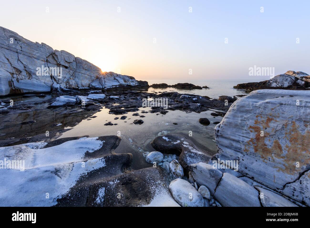 Aegean seashore and marble rocks in Aliki, Thassos island, Greece Stock ...