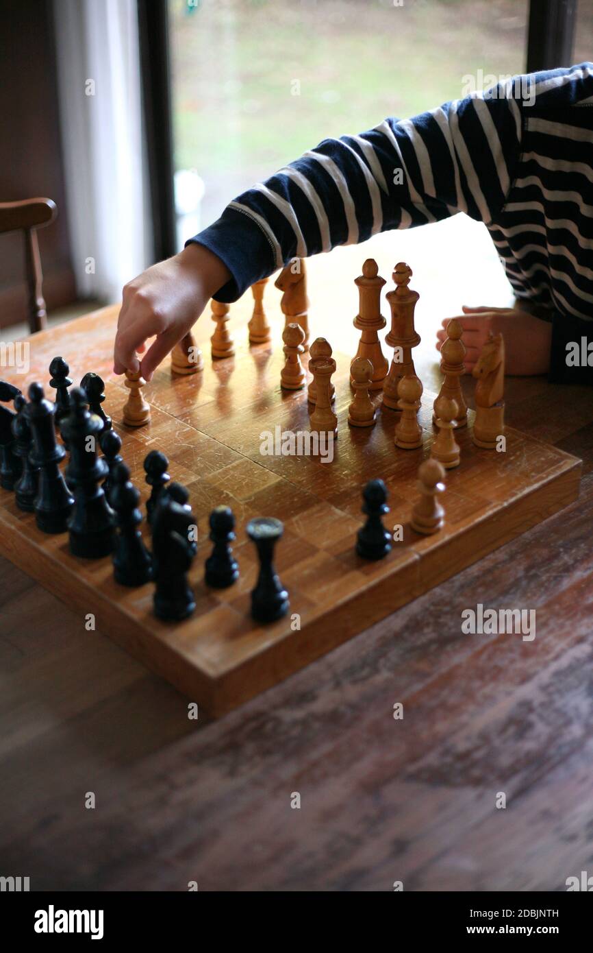 Child playing chess, Vancouver, British Columbia, Canada Stock Photo ...
