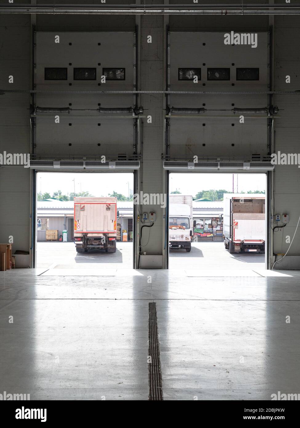 Cargo loading door ramp at distribution warehouse depot hi-res stock ...