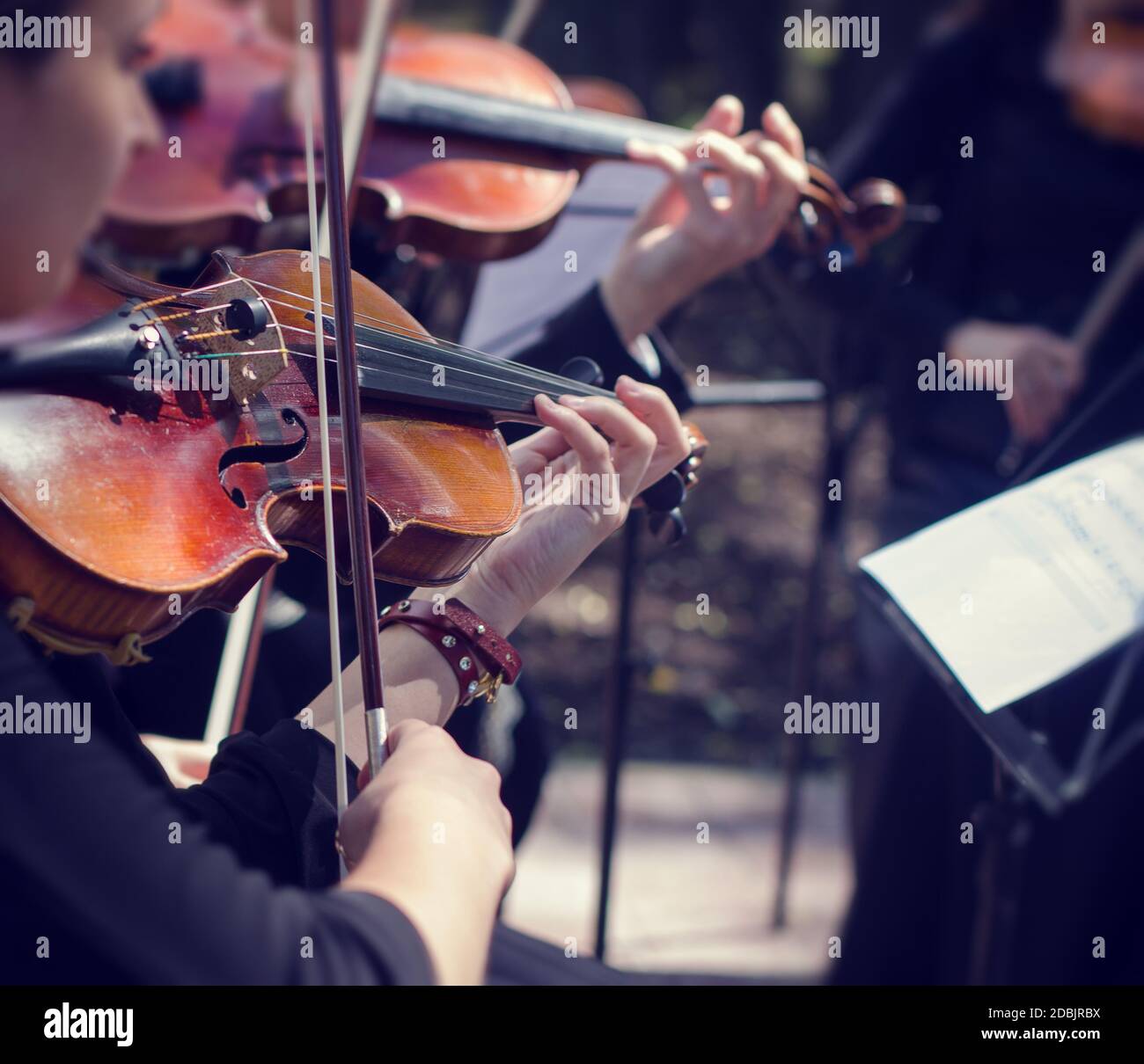 young woman playing violin Stock Photo - Alamy