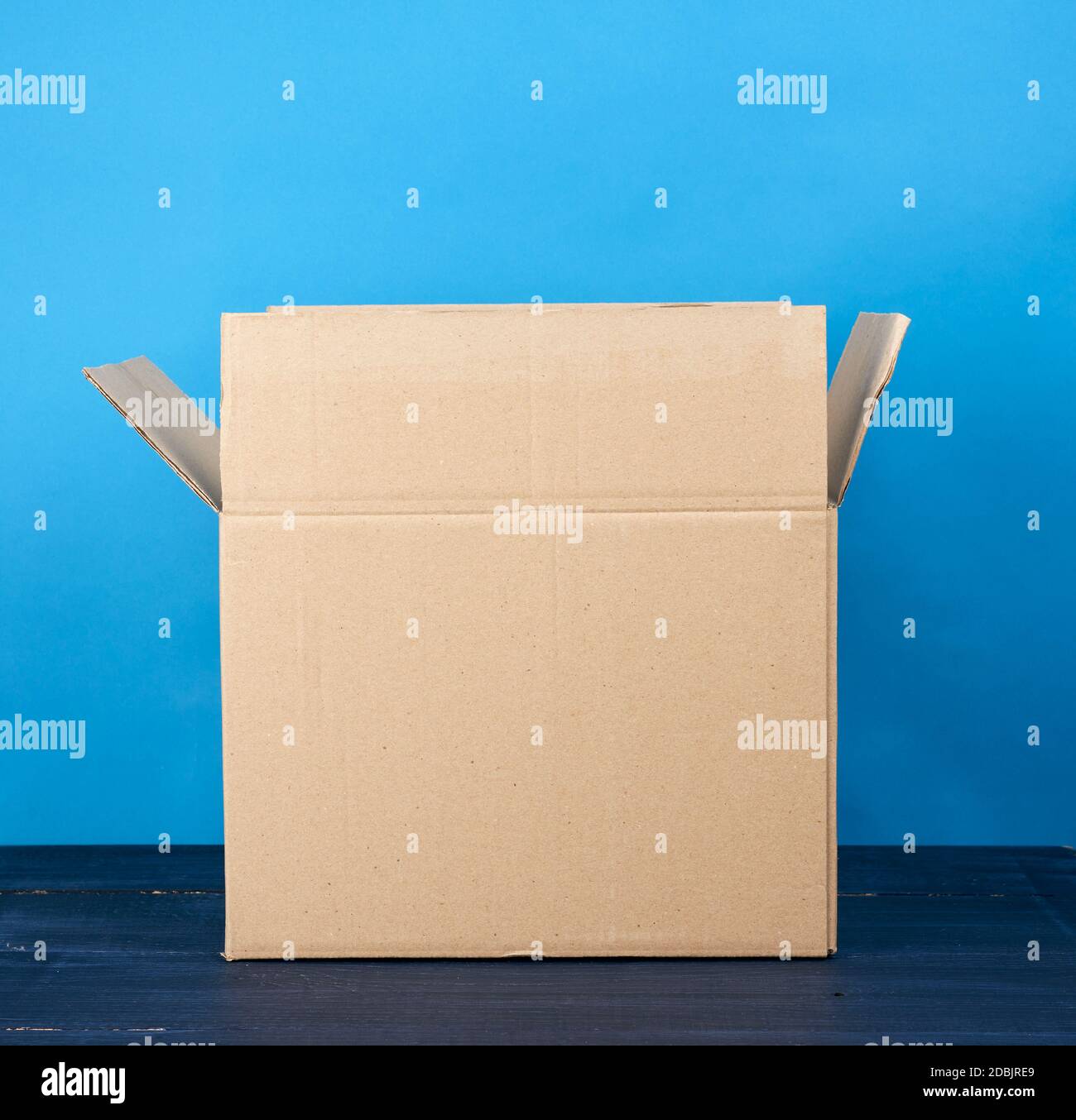 open empty brown rectangular cardboard box for transporting goods on ...