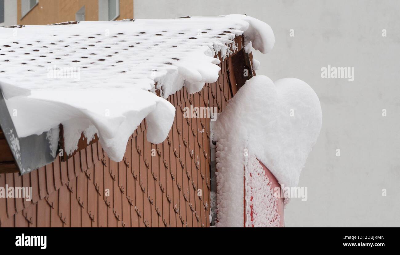 Snow drifting on a roof with forming of a heart figure Stock Photo - Alamy