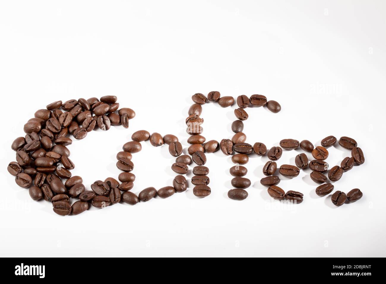 word coffee written with coffee beans on a white background Stock Photo ...