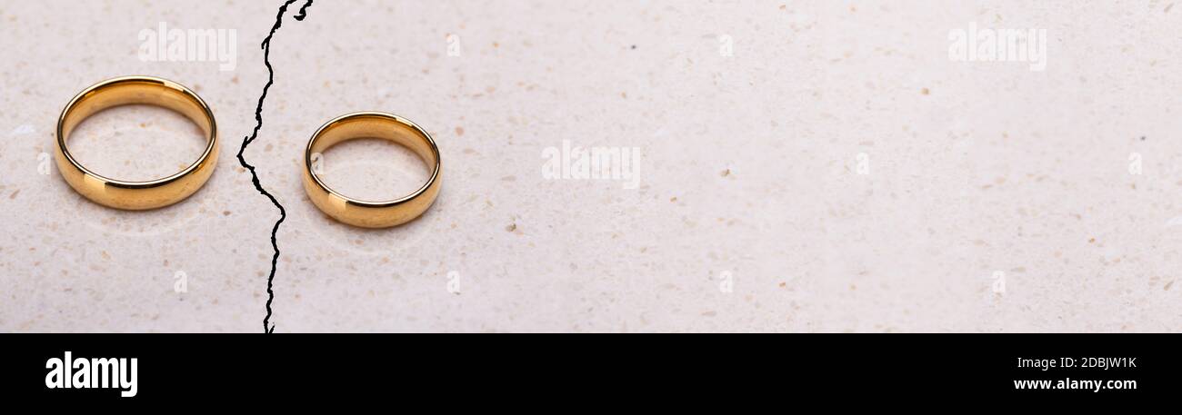 Separated Broken Wedding And Engagement Rings. Couple Divorce Stock ...