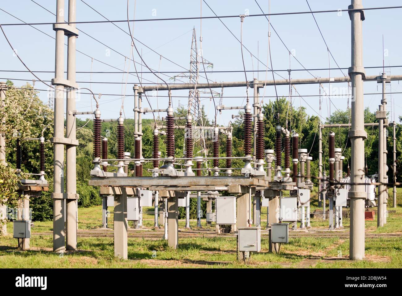 Old small electrical substation in the nature, powerline networking ...