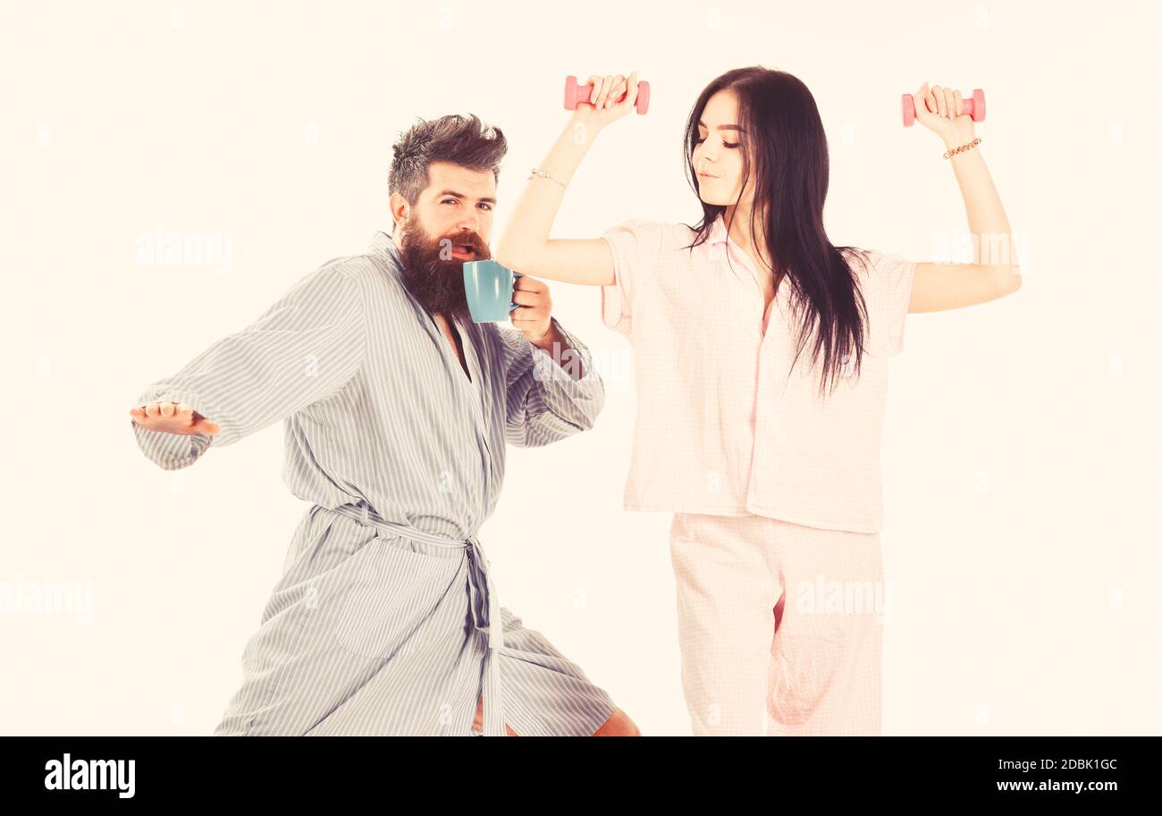 Couple in love in pajama, bathrobe stand isolated on white background ...