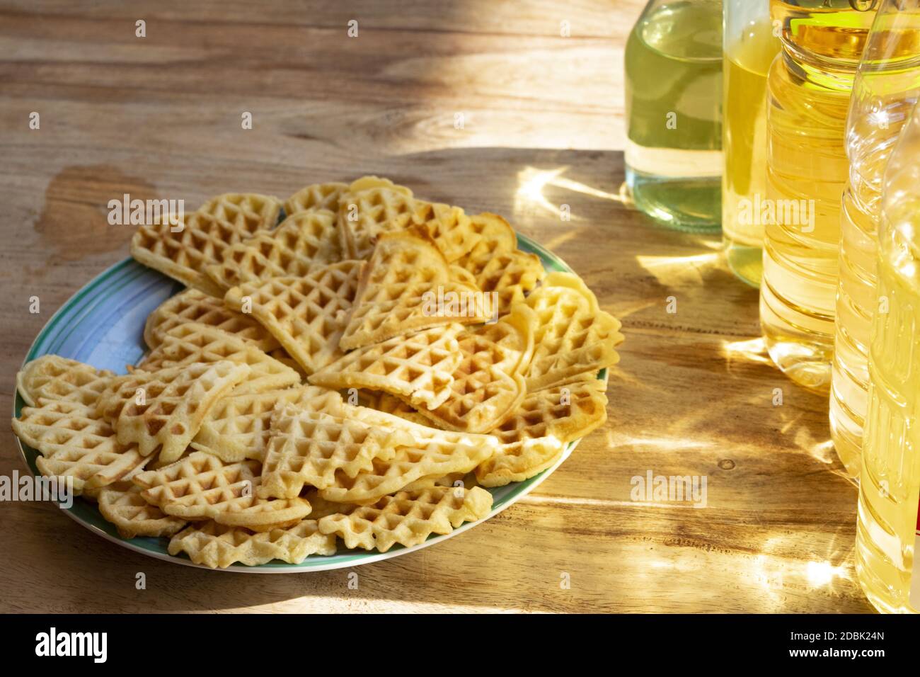 homemade wafers illuminated through a light filtered from the oil ...