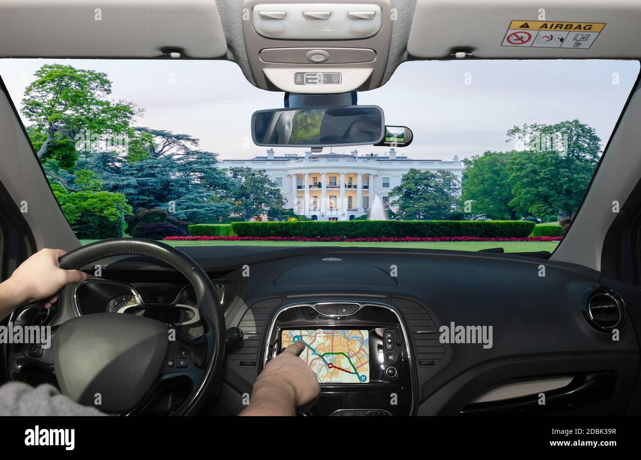 Driving a car while using the touch screen of a GPS navigation system ...