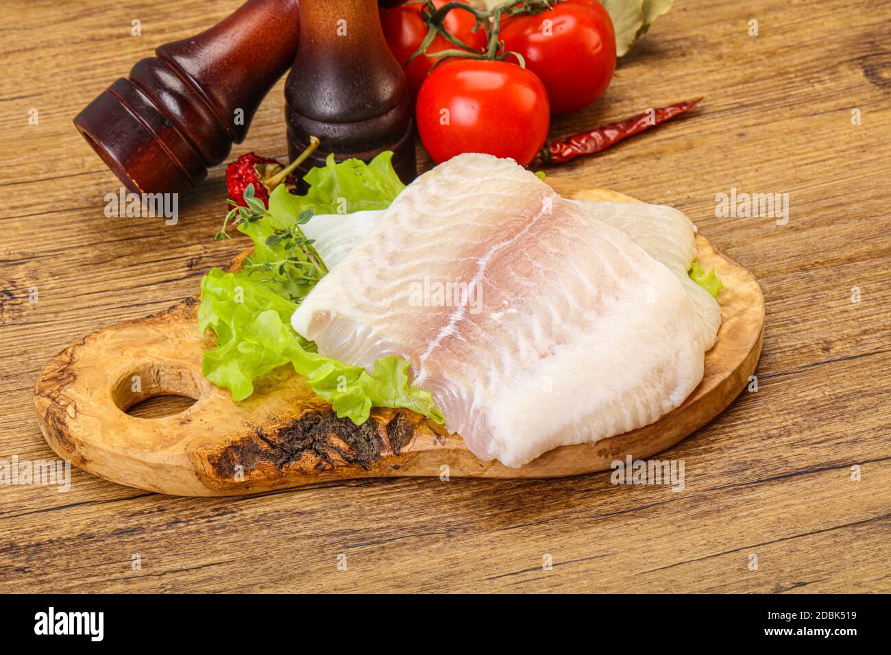 Raw pangasius fillet fish for cooking Stock Photo - Alamy