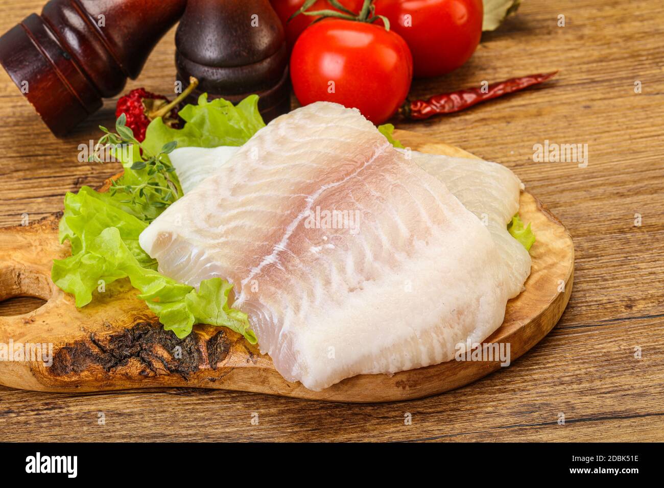 Raw pangasius fillet fish for cooking Stock Photo - Alamy