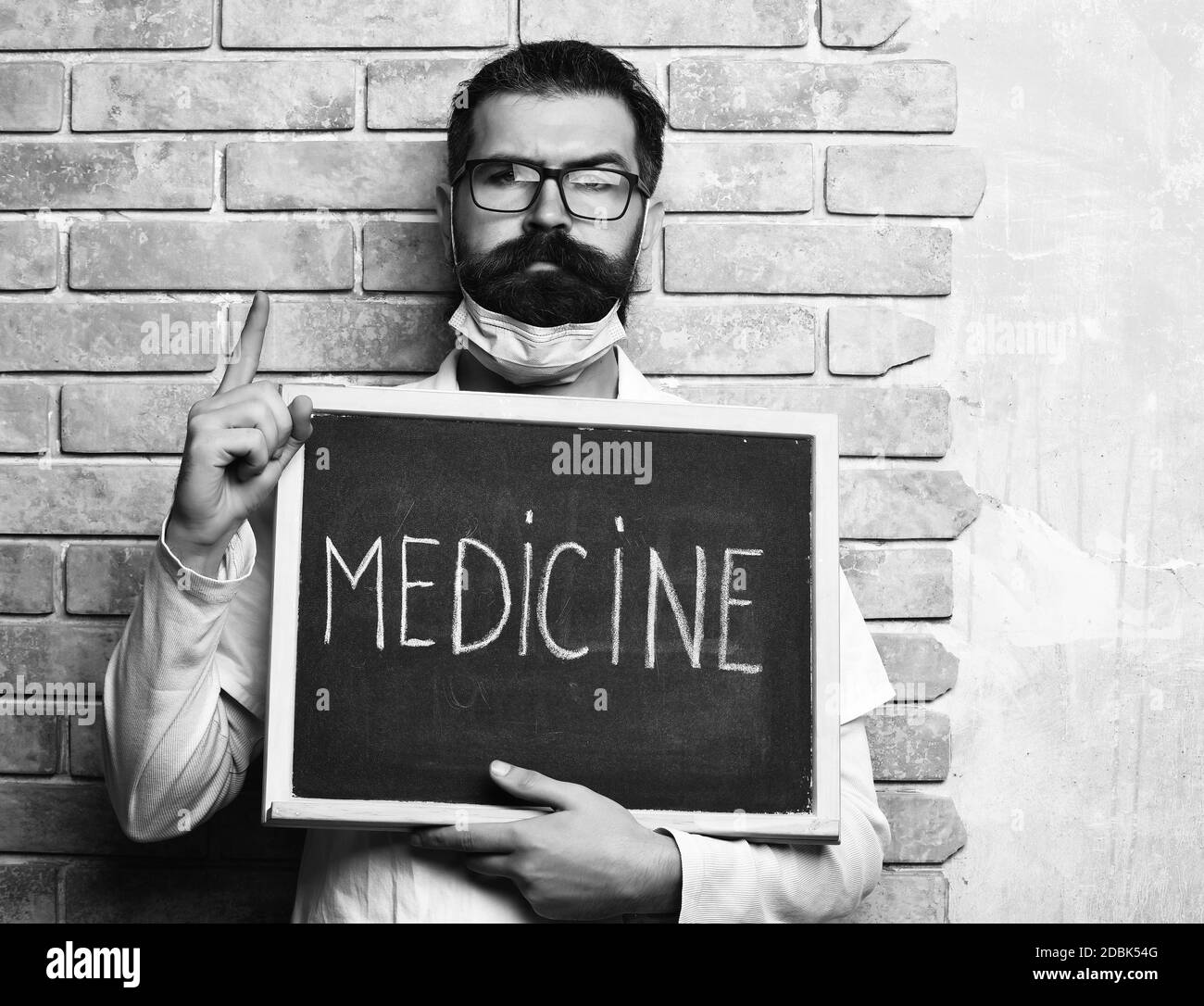 Bearded man, long beard. Brutal caucasian doctor or unshaven hipster ...