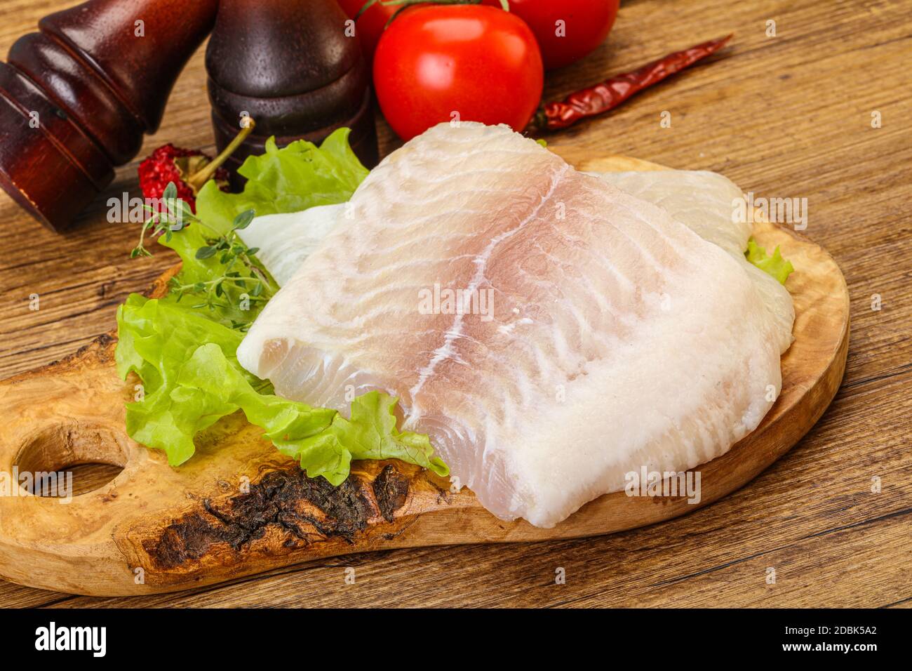 Raw pangasius fillet fish for cooking Stock Photo - Alamy