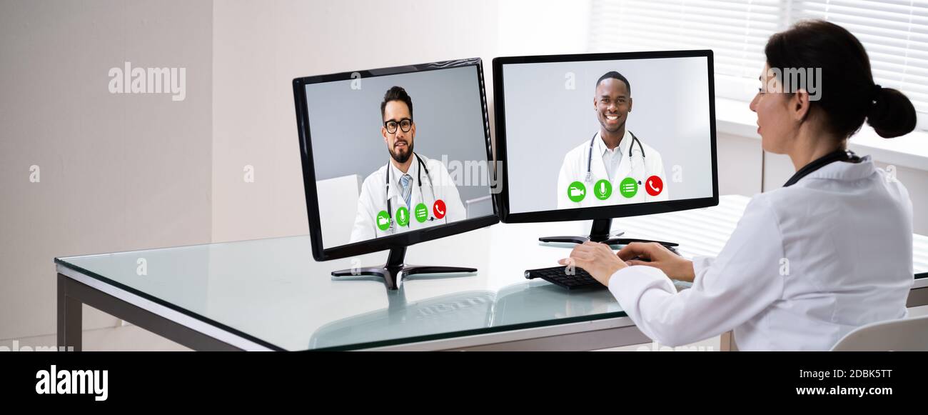 Medical Doctor Using Online Elearning Video Conference Technology Stock ...