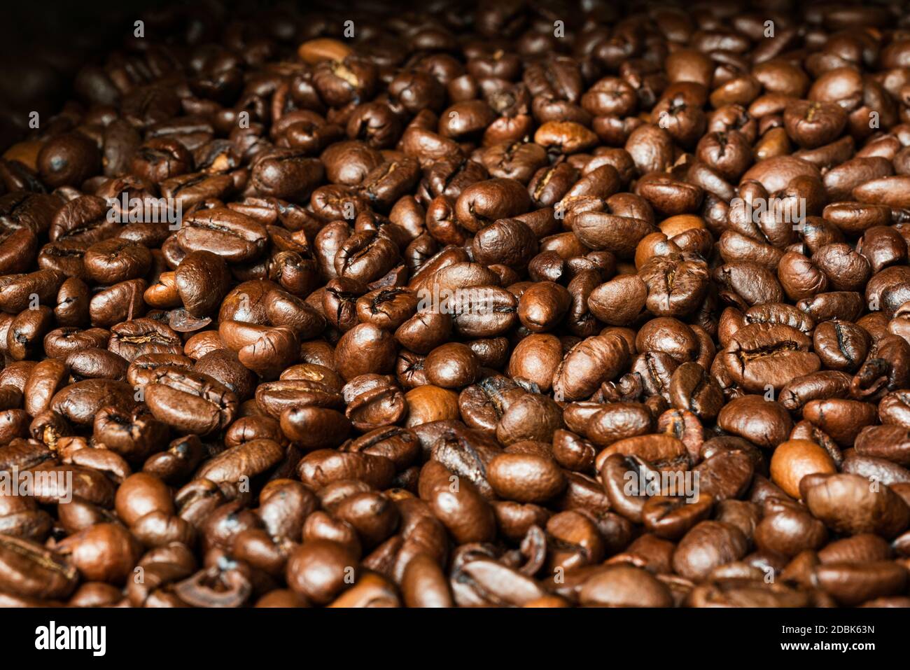 Coffee beans background view from above. Table top view Stock Photo - Alamy