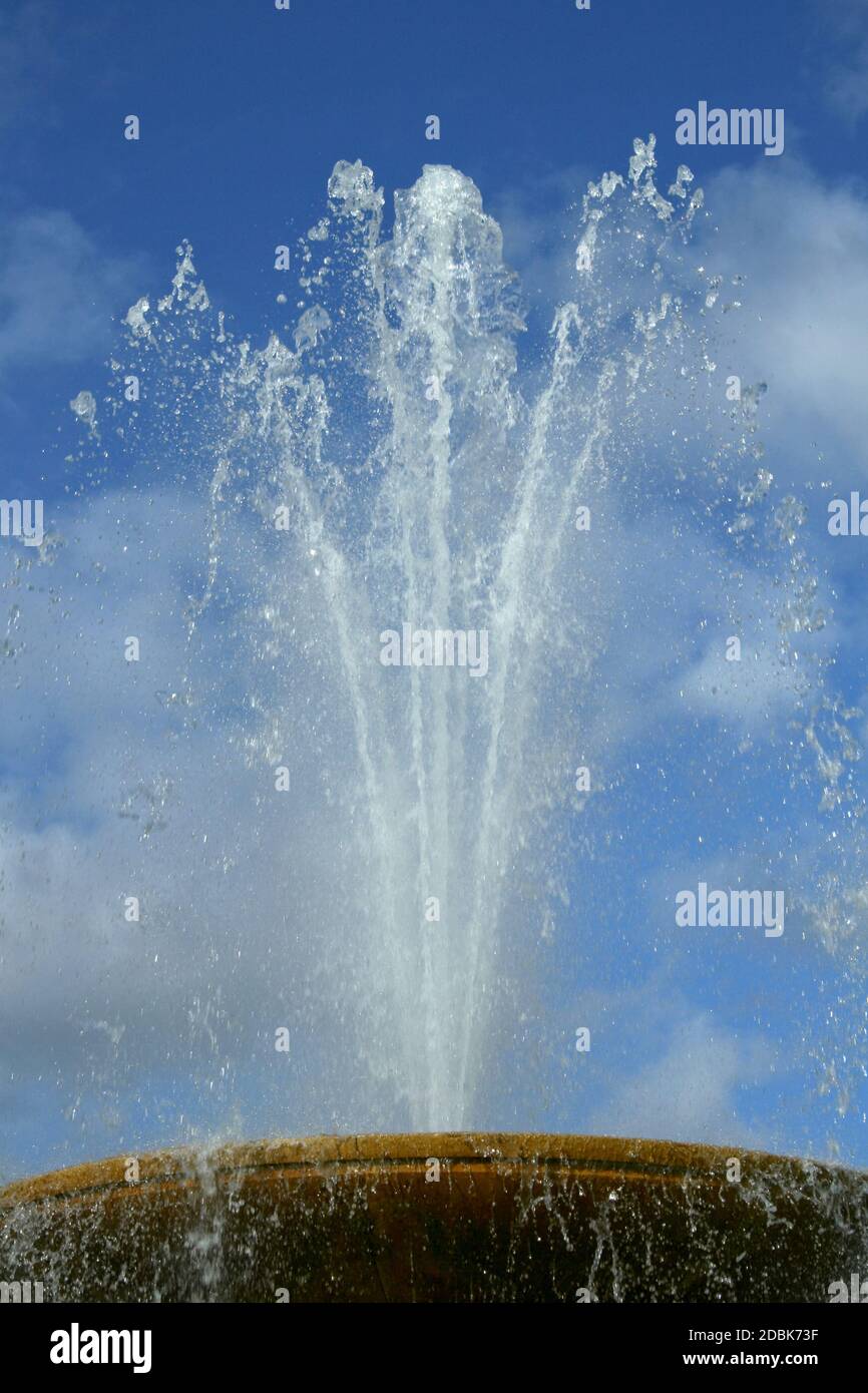 Detail of spraying water geyser in big fountain Stock Photo - Alamy