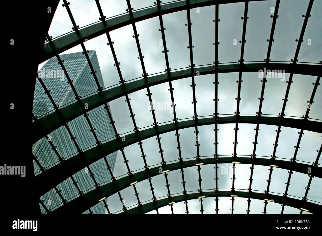 View of building under oval glass roof Stock Photo - Alamy