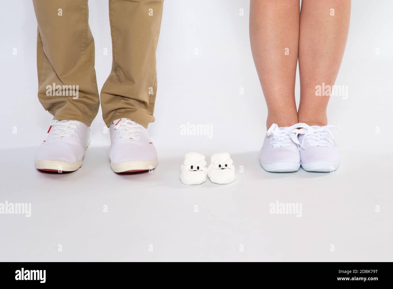 Two pairs of feet hi-res stock photography and images - Alamy