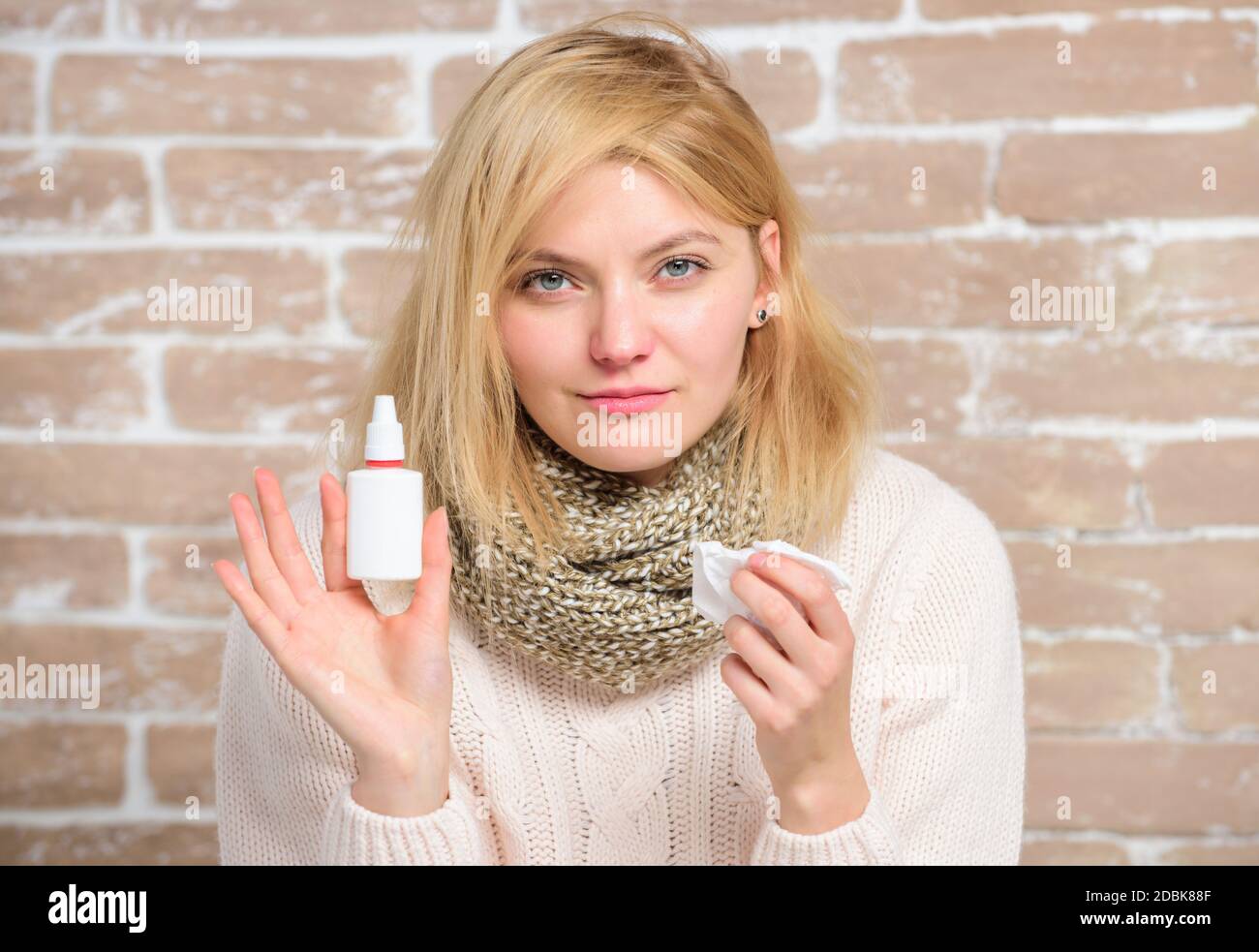 Girl sick person hold nasal drops and tissue. Allergy concept. Home ...