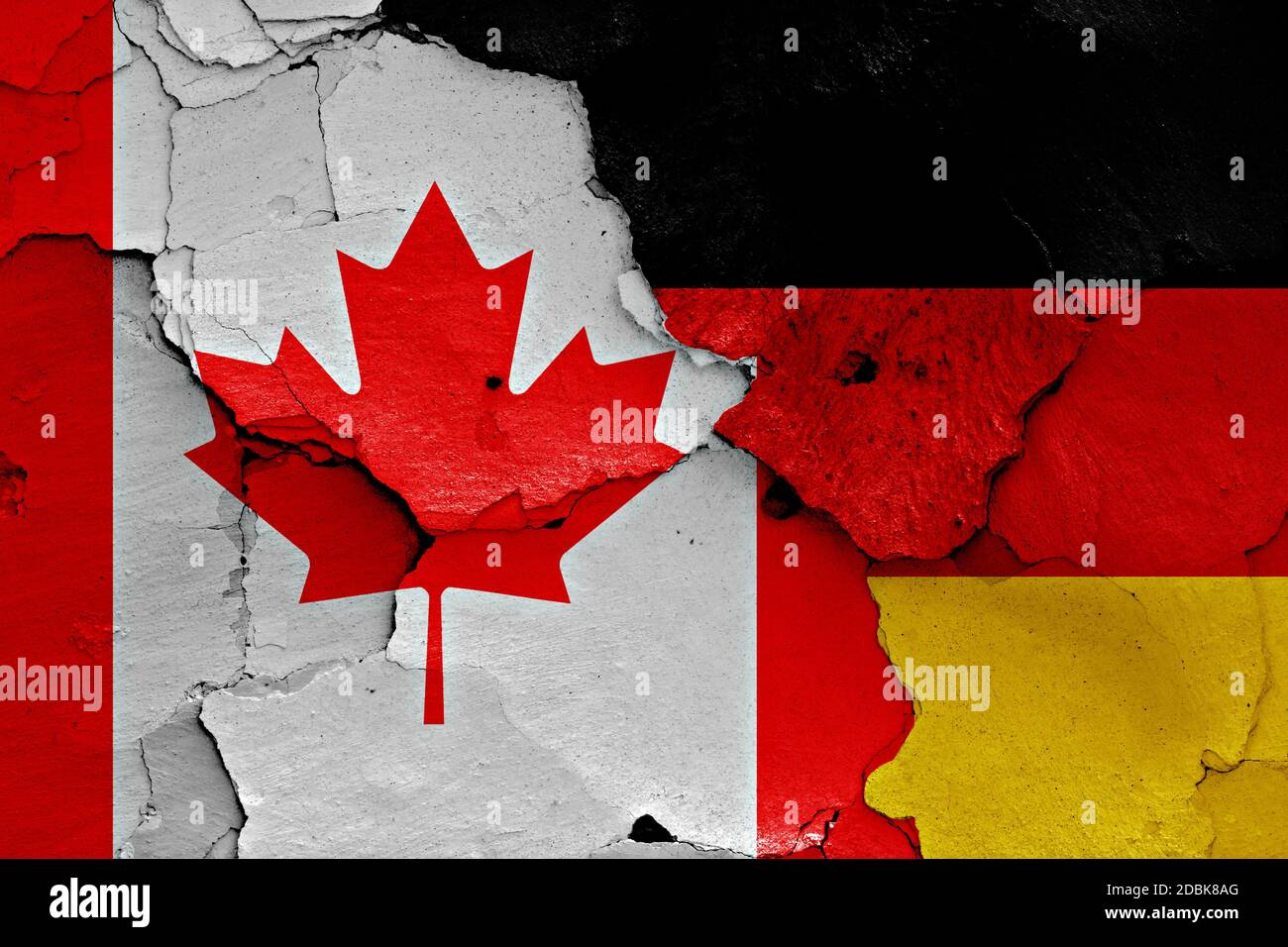flags of Canada and Germany painted on cracked wall Stock Photo - Alamy