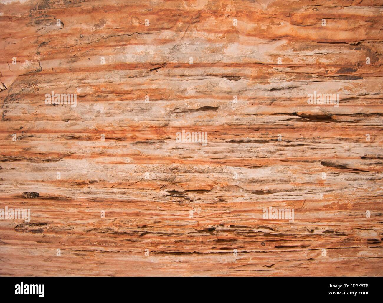 A photograph of a rock with colourful lines and fine grooves Stock ...