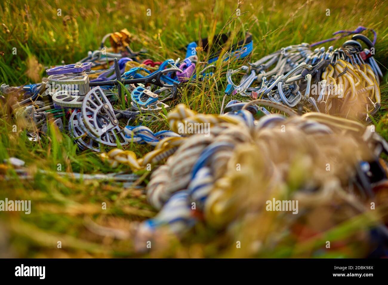 Climbing equipment lying in grass, Pembroke, Wales, UK Stock Photo - Alamy