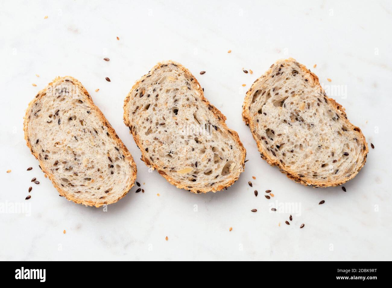 Multigrain bread slices on marble background, top view. Healthy bread ...