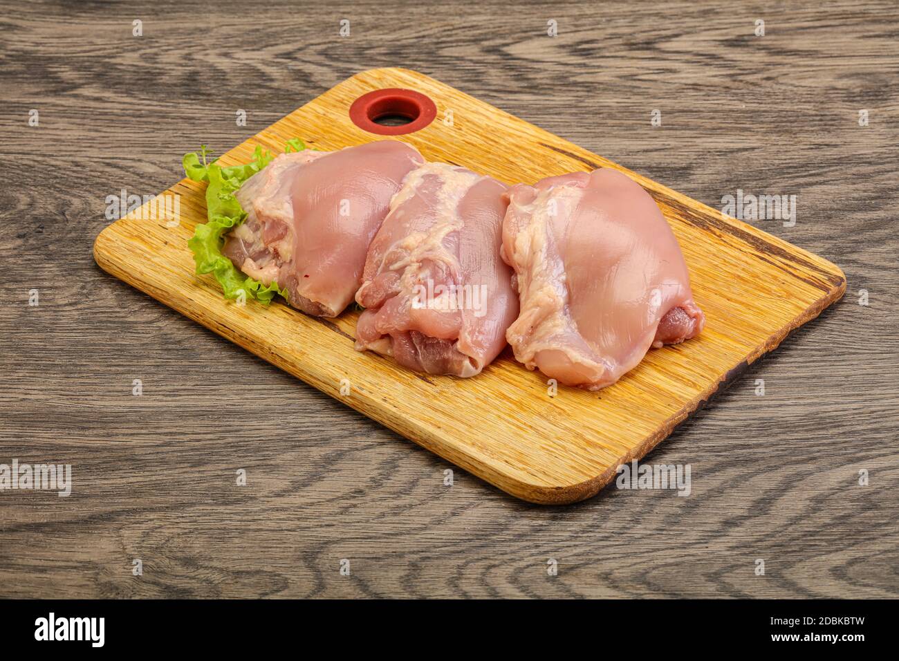 Raw chicken boneless and skinless leg for cooking Stock Photo - Alamy