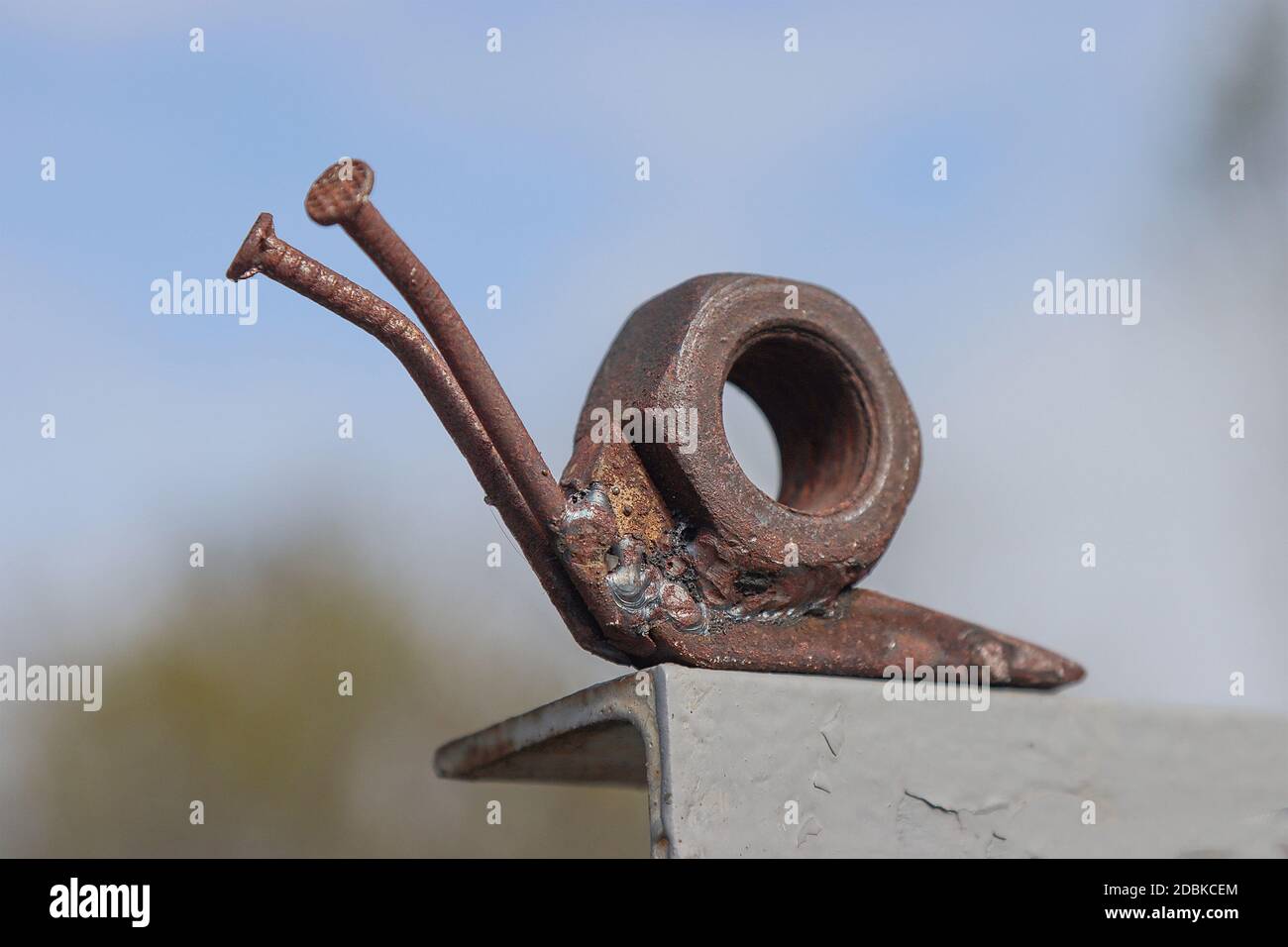 Snail made of metal nails and bolt Stock Photo - Alamy