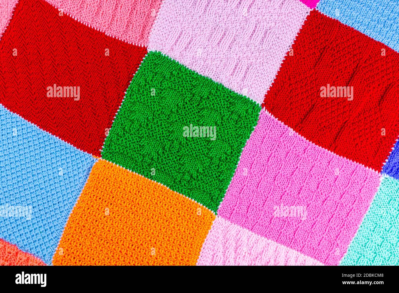 Knitted background. Knitted texture. A sample of knitting from wool ...