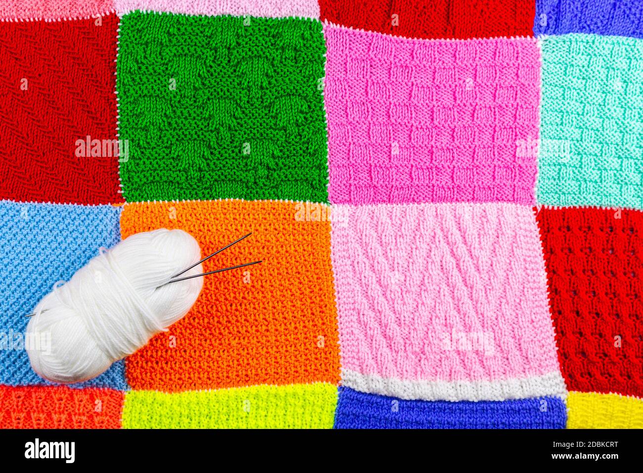 Knitted background. Knitted texture. A sample of knitting from wool ...