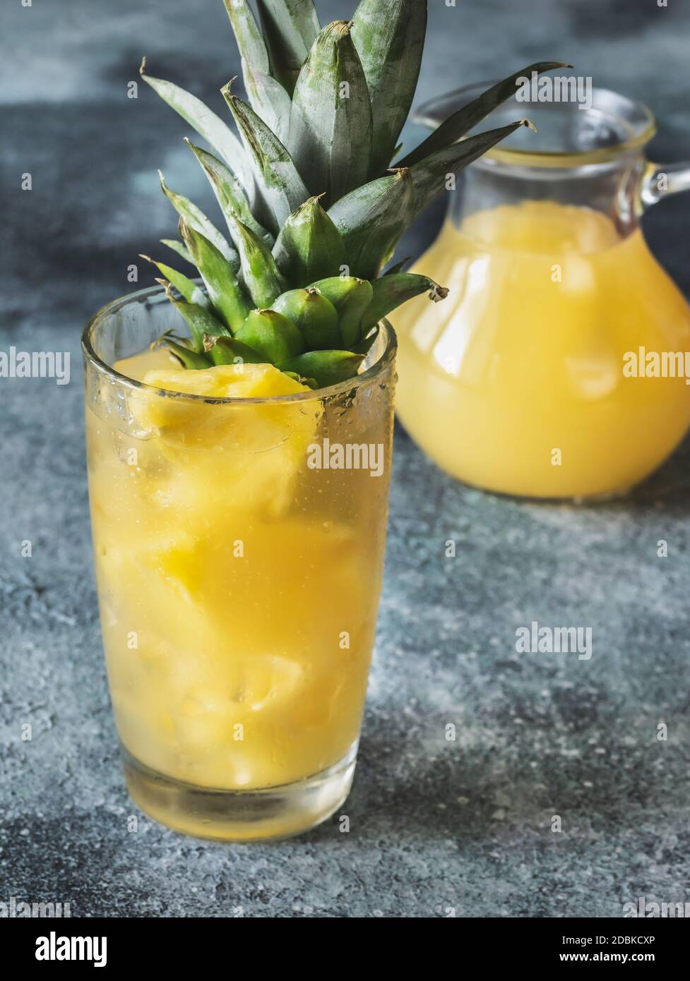 Full glass jug pineapple juice hi-res stock photography and images - Alamy