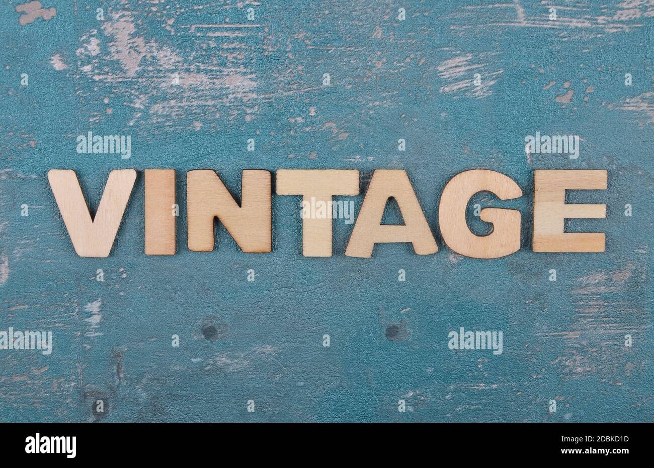Term from wooden letters on weathered concrete Stock Photo - Alamy