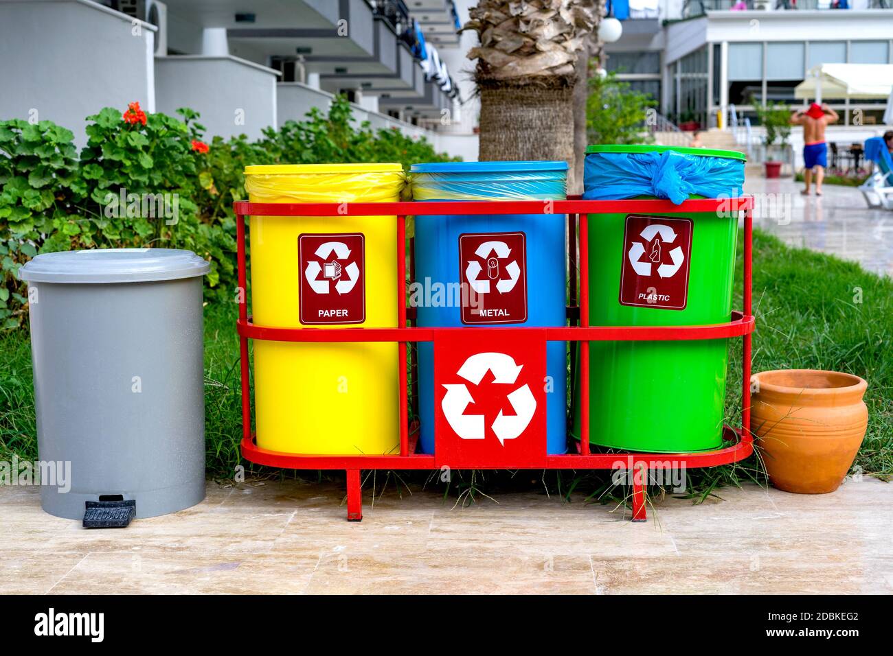Separate garbage collection. Waste recycling concept. Containers for ...
