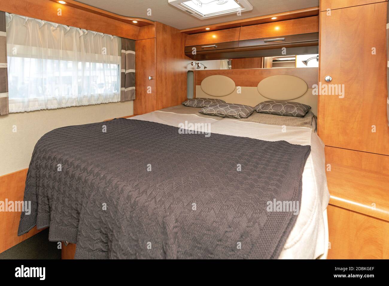 Big Bed in Mobile Home Camper Bedroom Stock Photo - Alamy