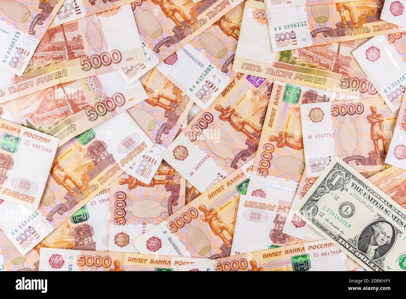 Russian 5000 rubles and 1 dollar close up, concept the is laid out as a ...