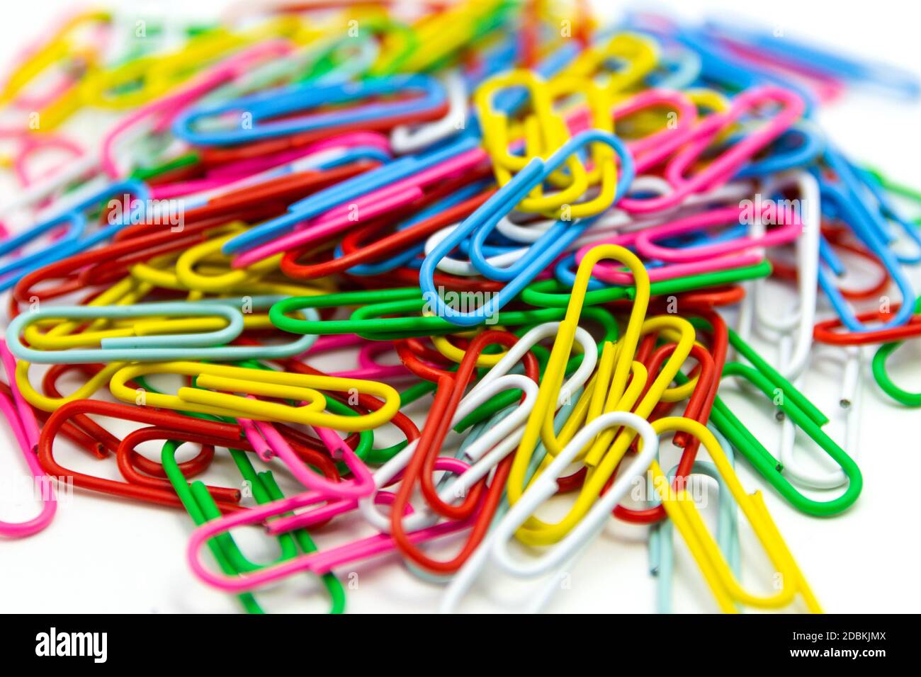 Collection of colorful Paper clips on white background Stock Photo - Alamy