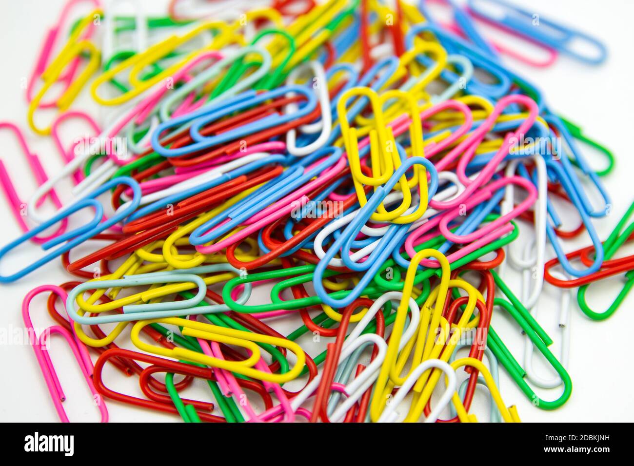 Collection of colorful Paper clips on white background Stock Photo - Alamy