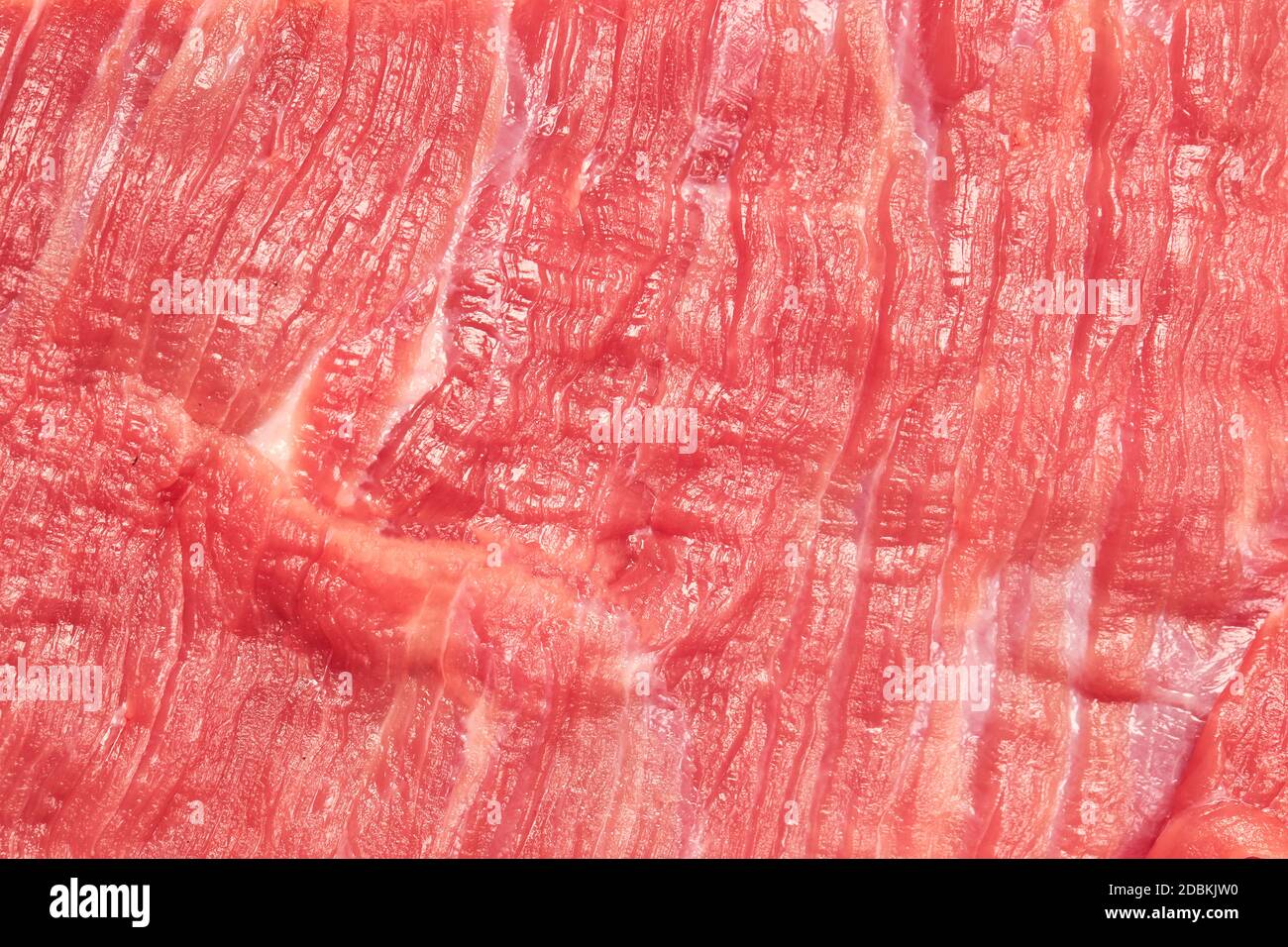 Texture of a red raw meat close up Stock Photo - Alamy