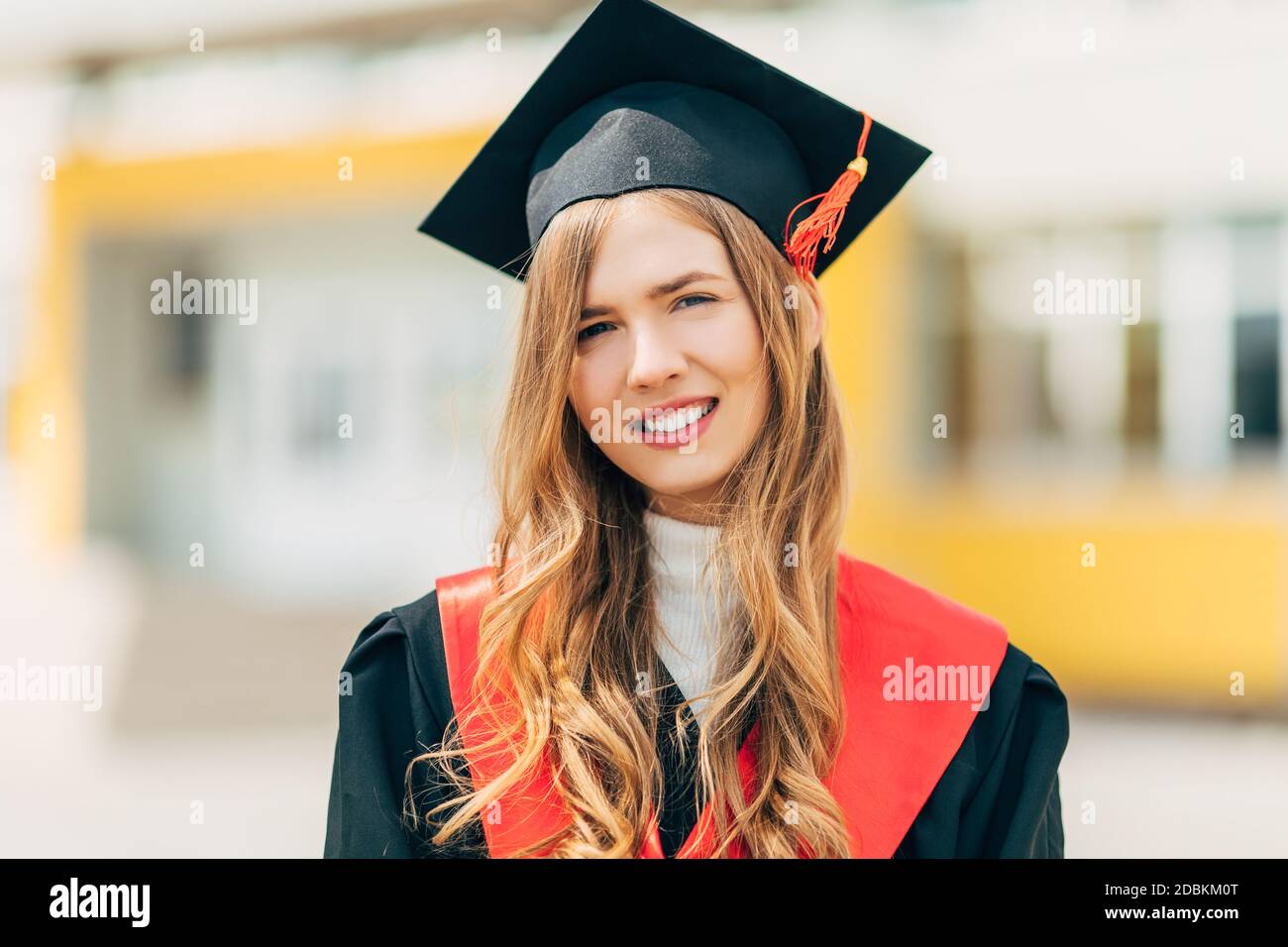 Happy beautiful graduate student with a diploma smiles. Concept of the ...