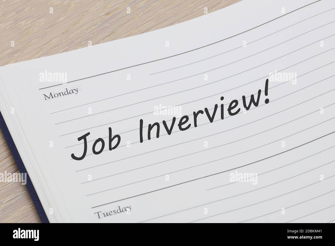 A job interview diary reminder open on desk Stock Photo - Alamy